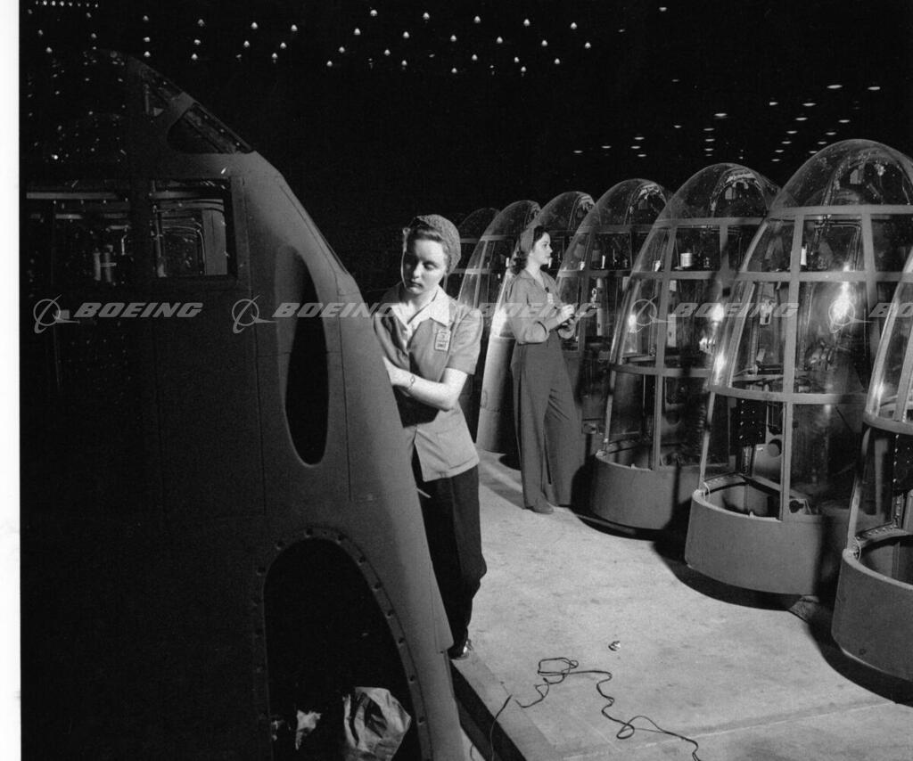 Boeing Images - Douglas Rosies Work on Plane Noses