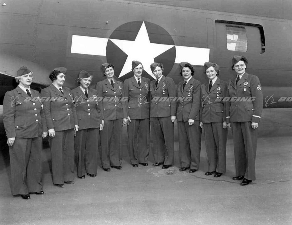 Boeing Images - Female Boeing Guards Stand by Plane in Kansas