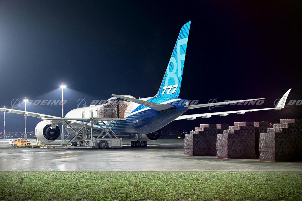 Boeing Images - Boeing 777-8F Cargo Loading on Ramp at Night