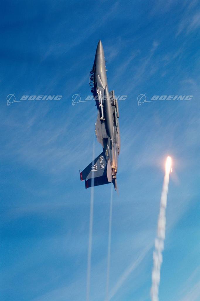 Boeing Images - F-15E Strike Eagle in Vertical Climb with Flare