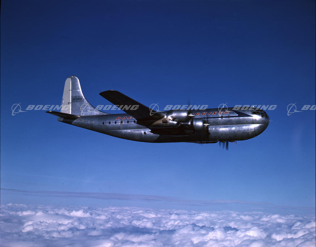Boeing Images - Boeing Model 377 Stratocruiser in Flight Above Clouds