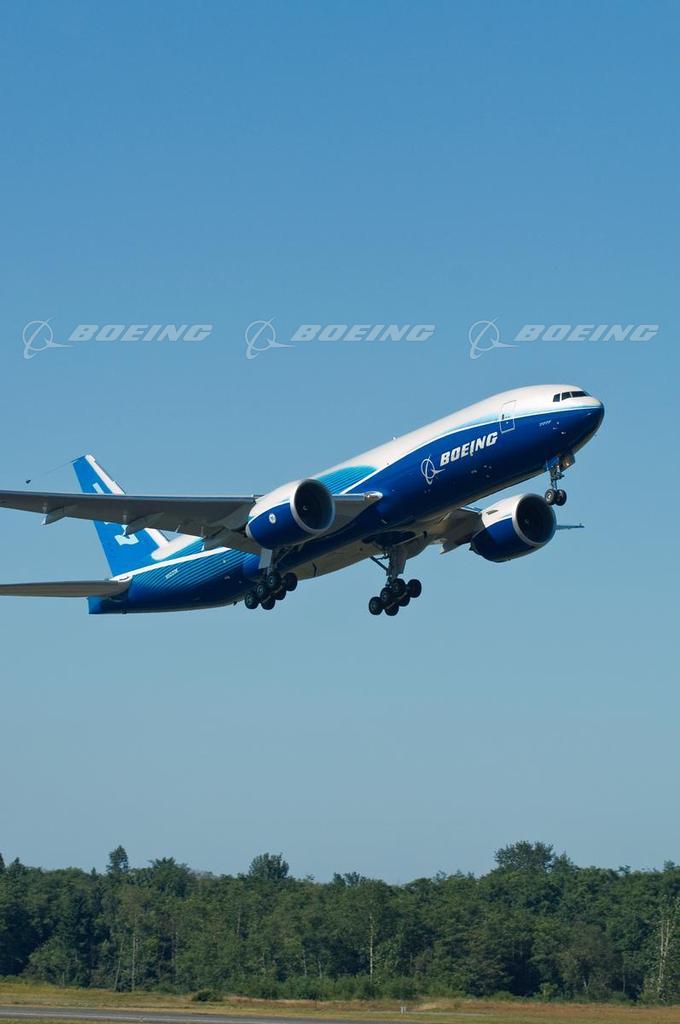 Boeing Images - 777 Freighter Ascends on its First Flight Takeoff