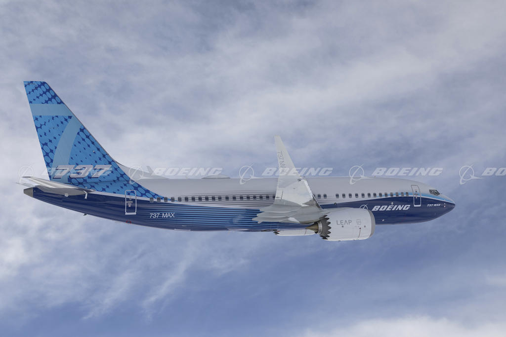 Boeing Images - Boeing 737-7 Unified Livery In-flight In Clouds