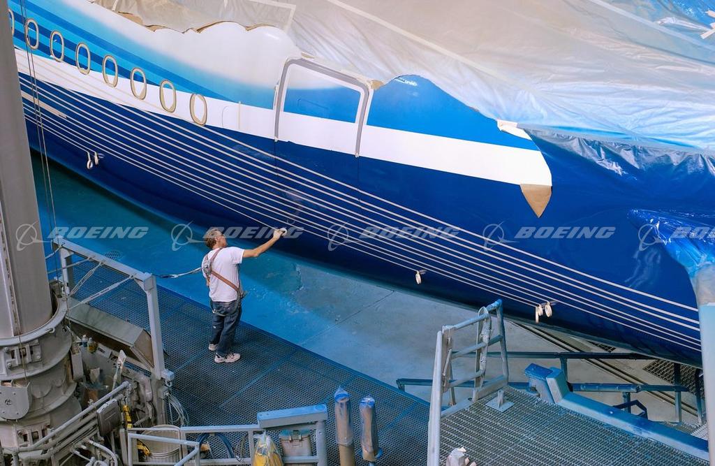 Boeing Images - New Boeing Livery is Applied to a 777-200LR at the ...
