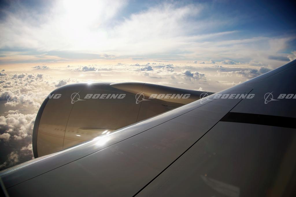 Boeing Images - 777-300ER Wing and Nacelle Above Clouds