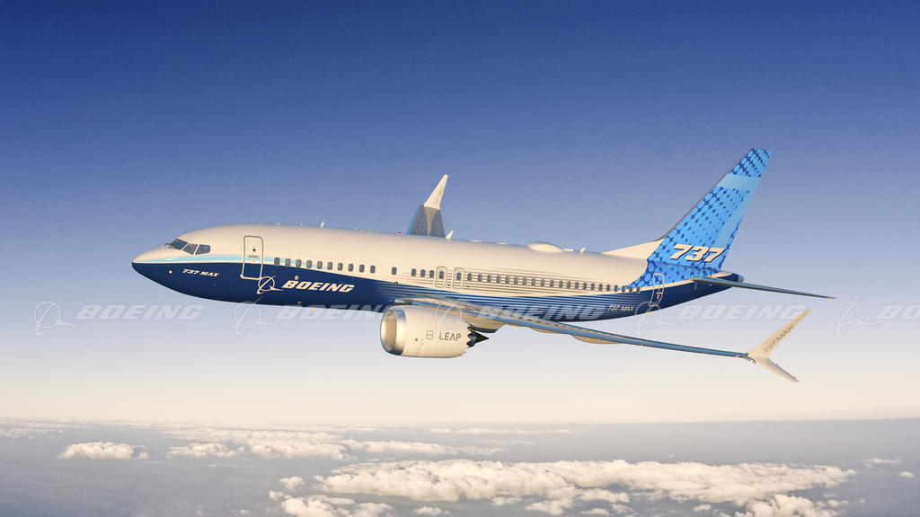 Boeing Images - Boeing 737-7 Unified Livery In-flight Over Clouds