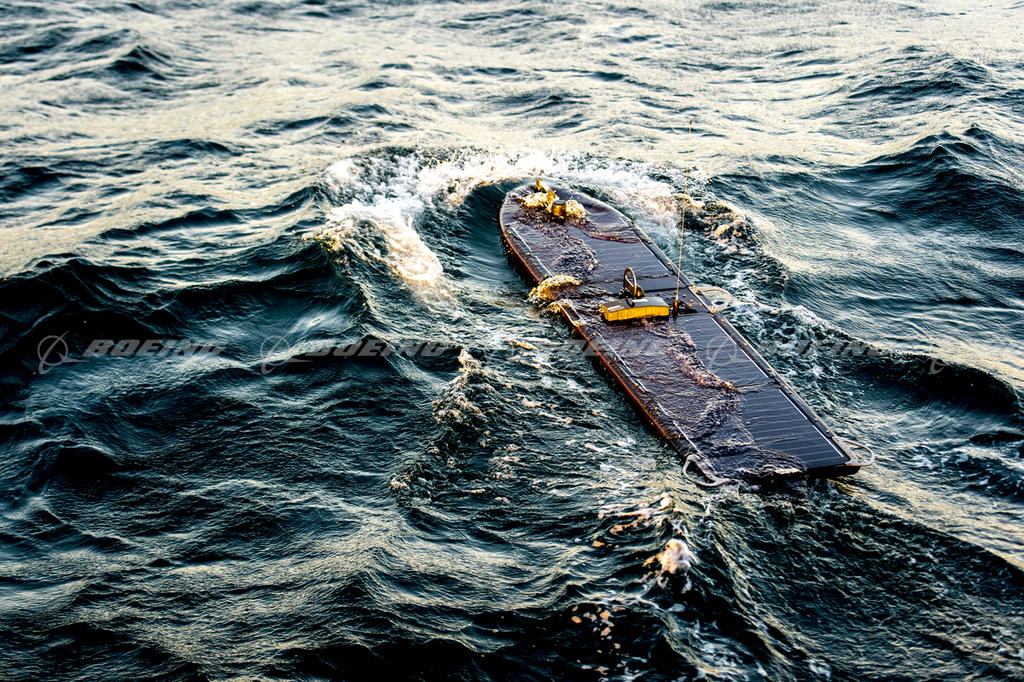 Boeing Images - Wave Glider rides choppy waves on the ocean surface ...