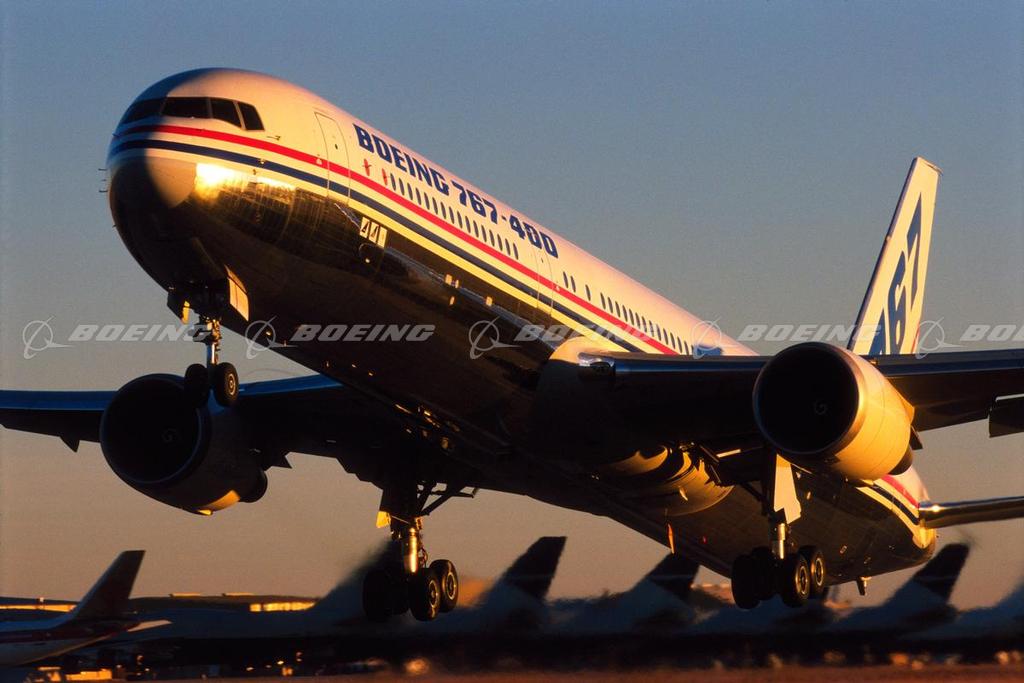 Boeing Images - 767-400ER Landing in Front of Flight Line