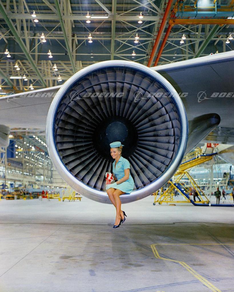 Boeing Images - Lufthansa Stewardess Poses with first 747