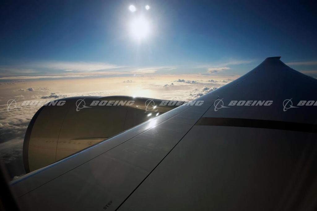 Boeing Images - 777-300ER Wing and Nacelle Above Clouds