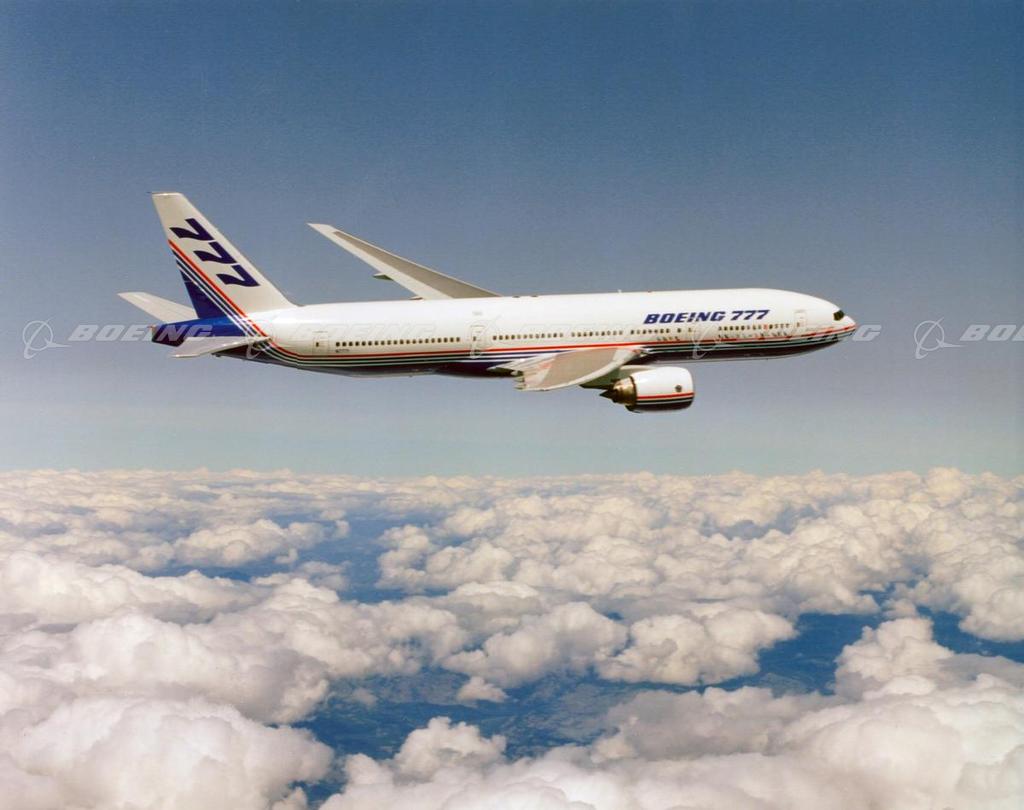 Boeing Images - First 777-200 Flies Over Clouds