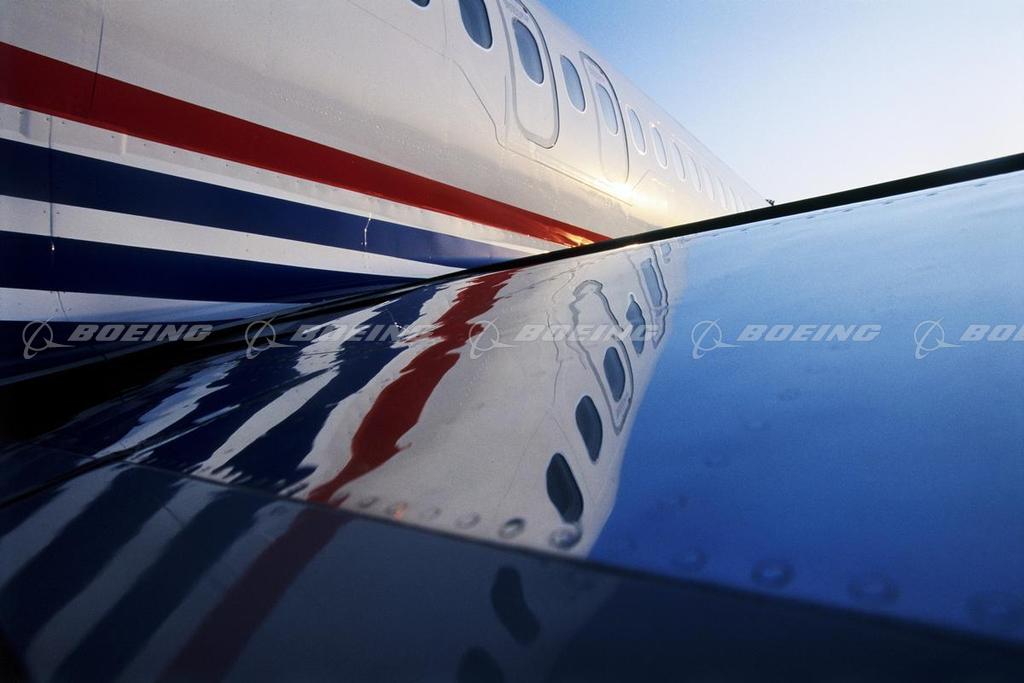 Boeing Images - 717-200 Red,White and Blue Livery Stripes Reflected on ...