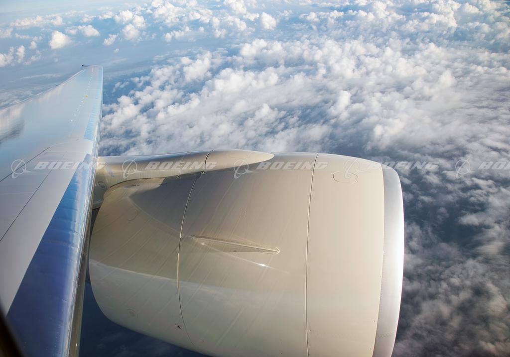 Boeing Images - 777-300ER Wing and Nacelle Above Clouds