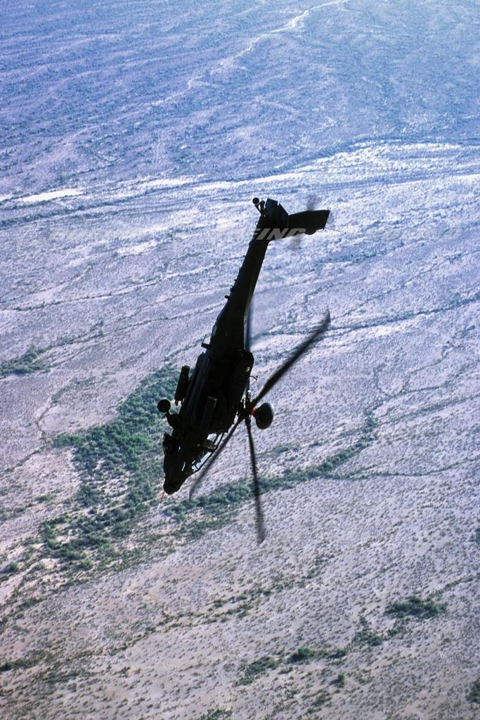 Boeing Images - AH-64D Apache Longbow Upside Down Aerobatics
