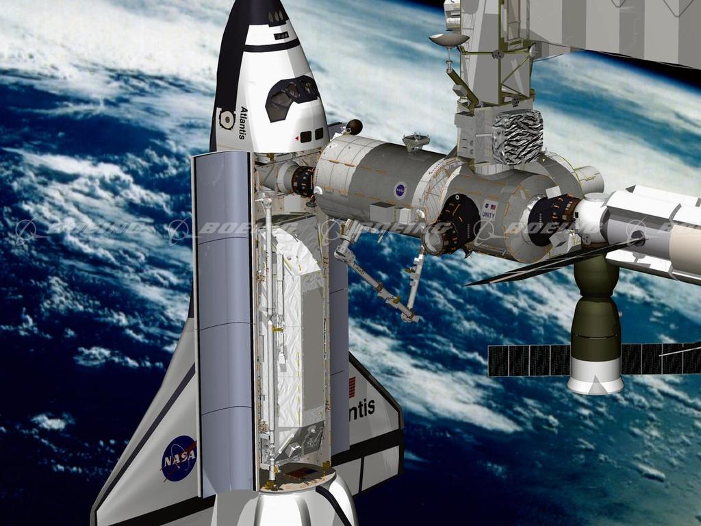 Boeing Images - Space Shuttle Atlantis Docked at the International ...