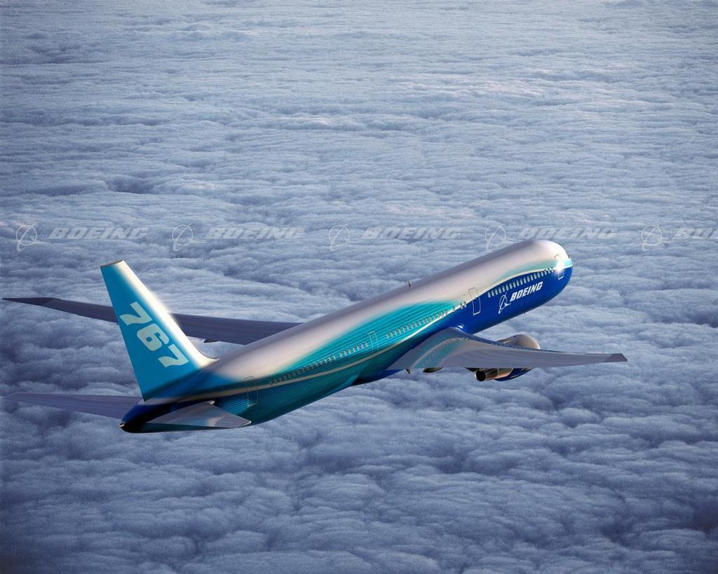 Boeing Images - 767-400ER in New Boeing Livery in Flight Above the Clouds