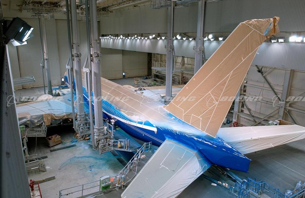 Boeing Images - New Boeing Livery is Applied to a 777-200LR at the ...