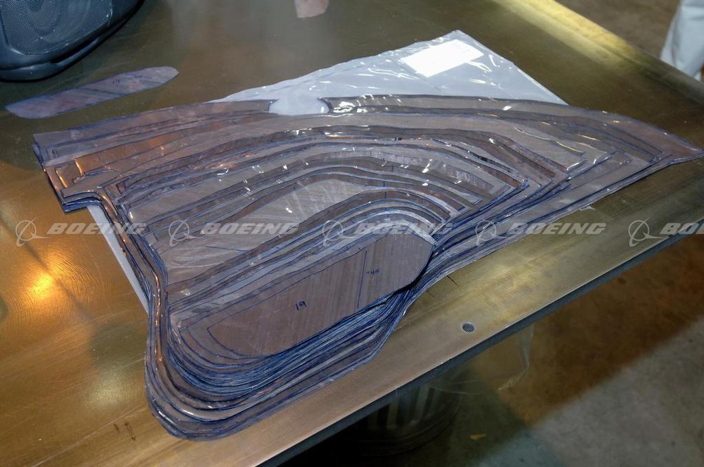Boeing Images - Pre-cut Carbon Fiber Ply Layers are Prepared for Repair