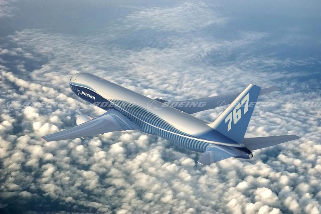 Boeing Images - Boeing 767-300 Freighter over Clouds