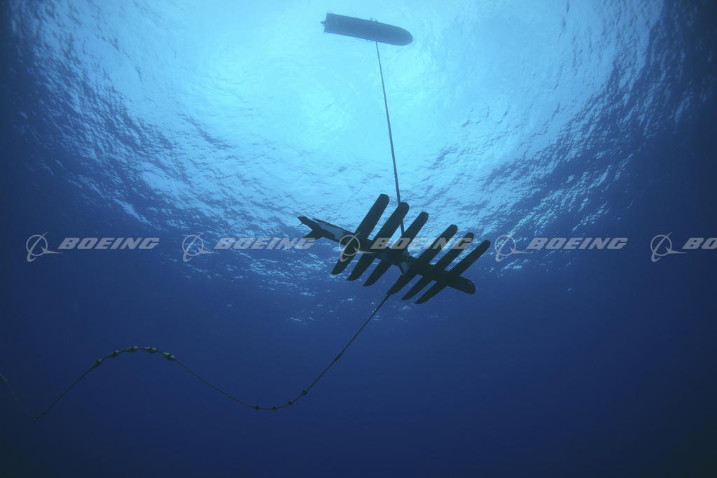 Boeing Images - The Wave Glider's sub transforms wave energy into ...