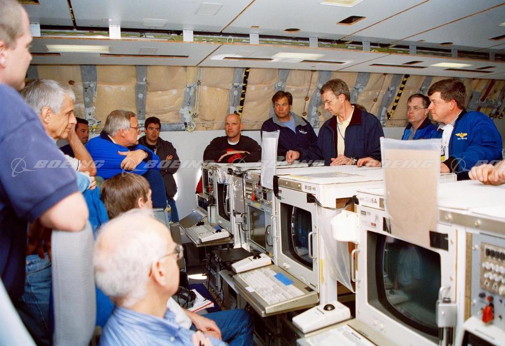 Boeing Images - Flight Test Personnel Meet Aboard 777-300ER
