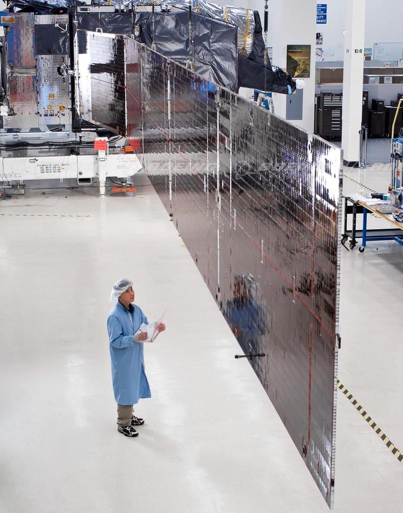 Boeing Images - Inspecting Thuraya Solar Panel.