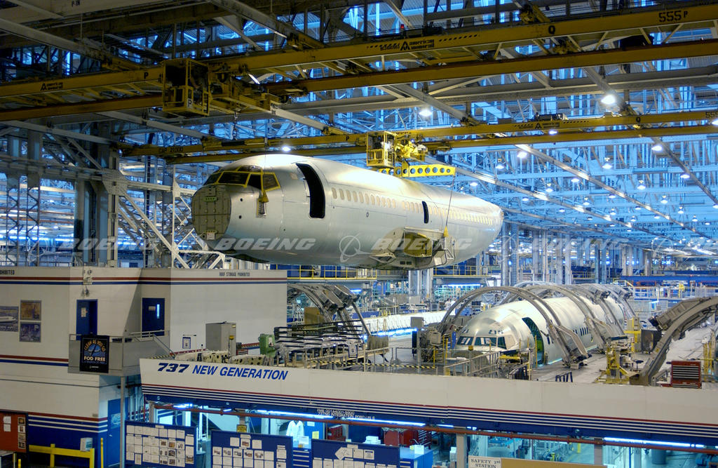 Boeing Images - Boeing 737 Fuselage Lifted by Bridge Crane