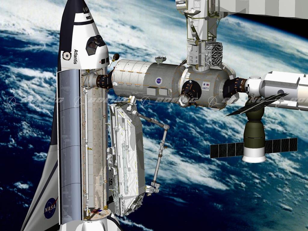 Boeing Images - Space Shuttle Atlantis Installs the S0 Truss on the ...