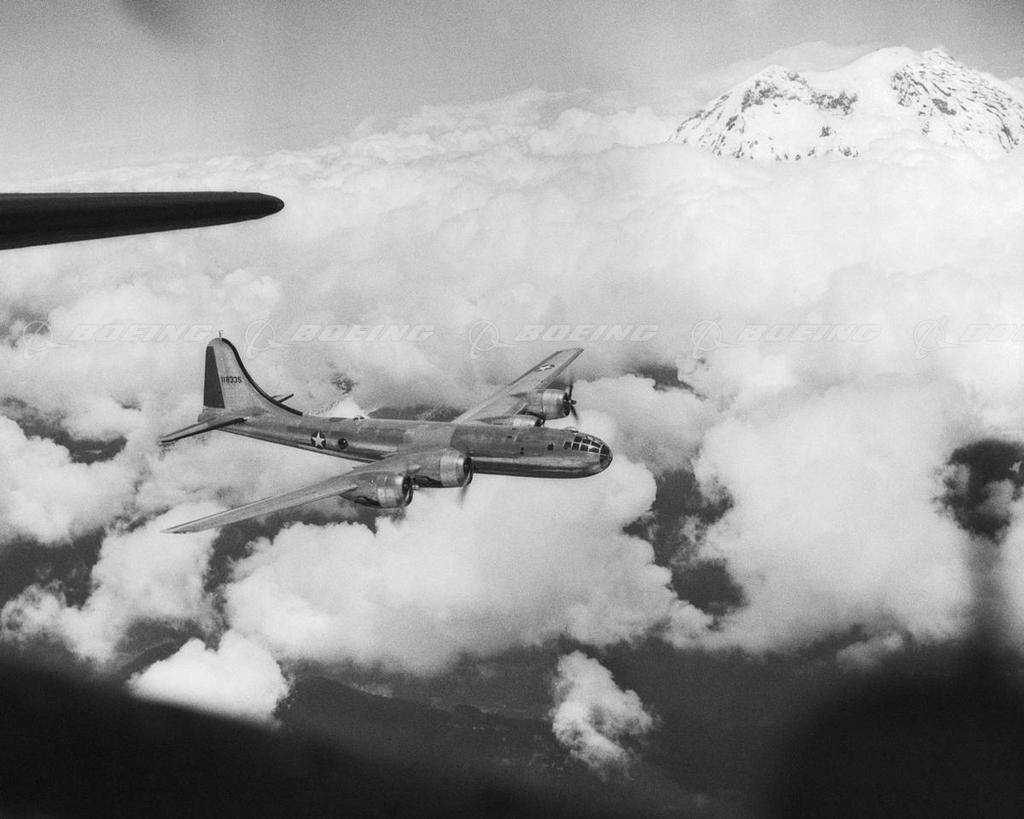 Boeing Images - XB-29 Superfortress in Flight Over Mountains