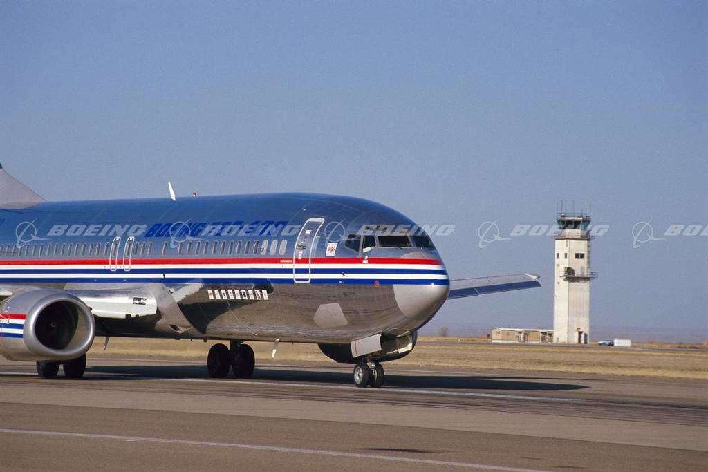 Boeing Images - 737-400 on Runway in Front of Control Tower