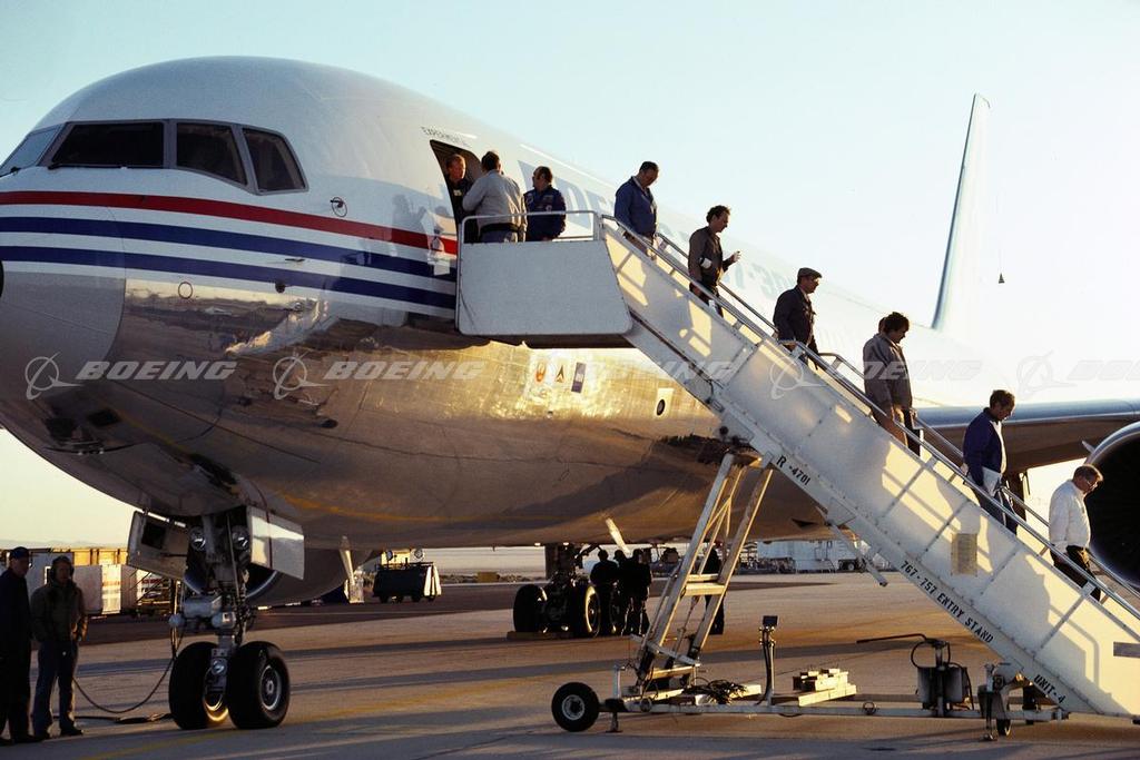 Boeing Images - Passengers Exiting a 757-300 Via Air Stairs