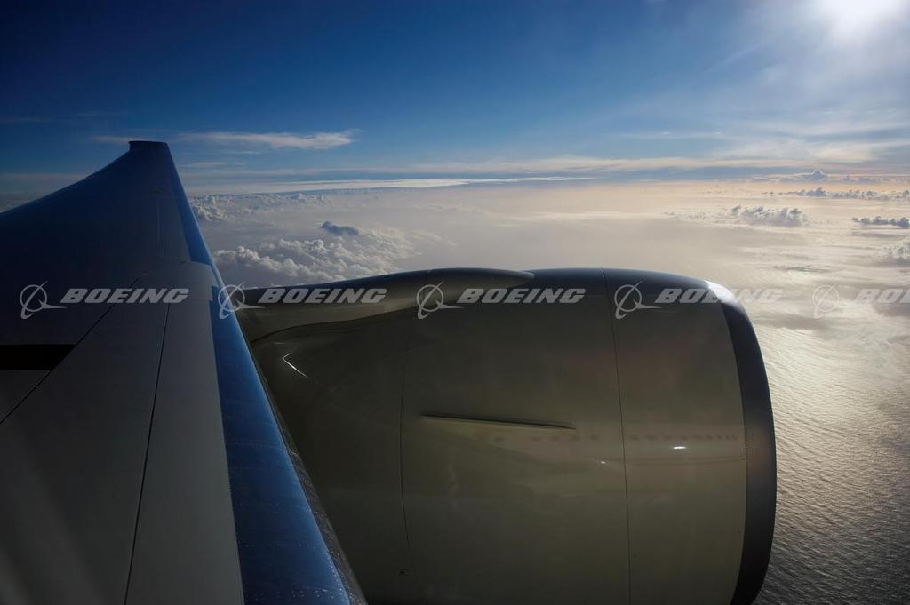 Boeing Images - 777-300ER Wing and Nacelle Above Clouds