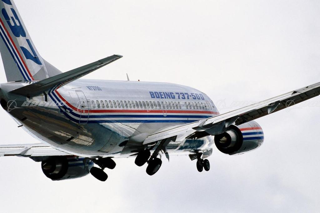 Boeing Images - 737-500 Retracting Landing Gear in Flight