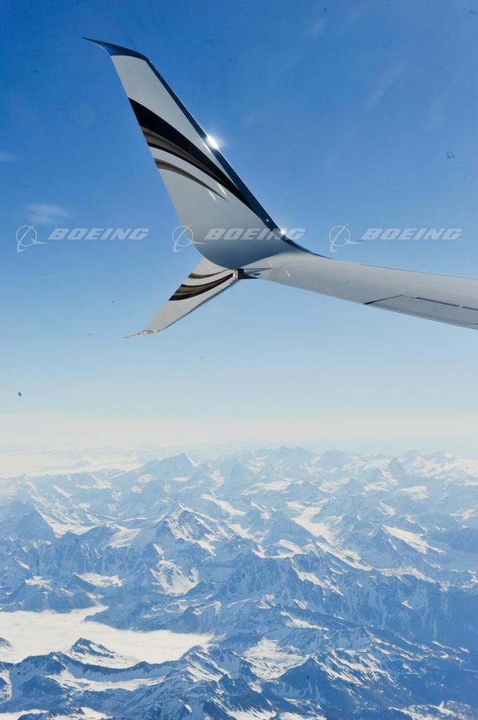 Boeing Images - BBJ Split Scimitar Winglet Flies above the Alps