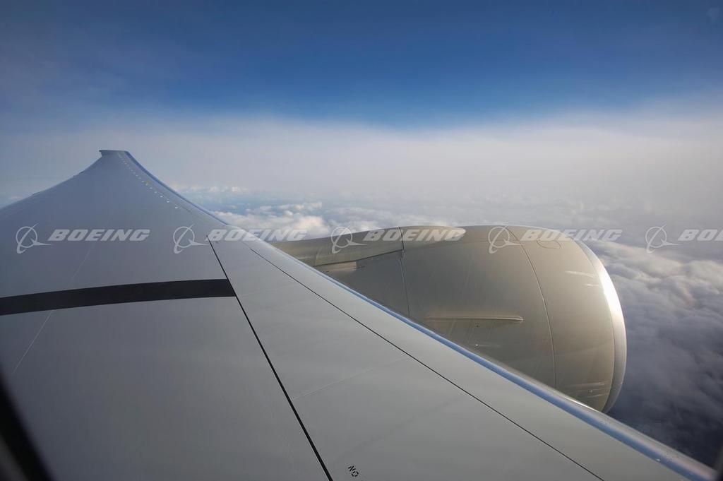Boeing Images - 777-300ER Wing and Nacelle Above Clouds