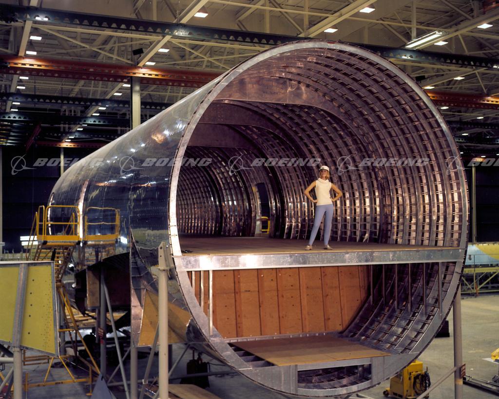 Boeing Images - Woman Poses in First 747 Fuselage Structure