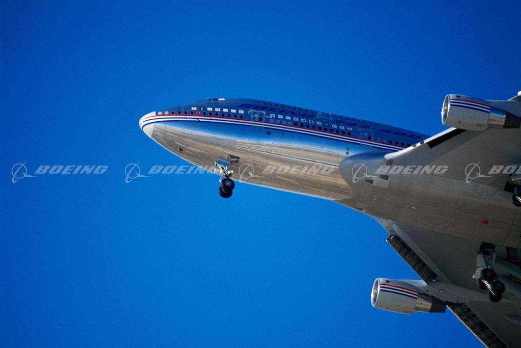 Boeing Images - Silver 747-400 in Flight