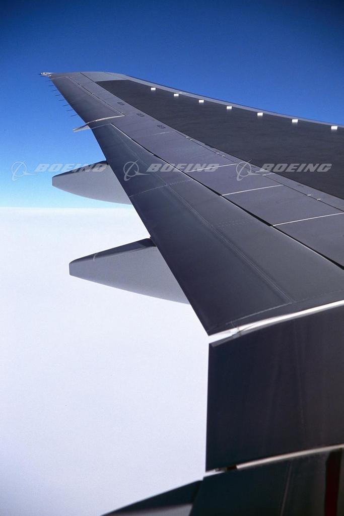 Boeing Images - 777 in Flight, Trailing Edge of Left Wing