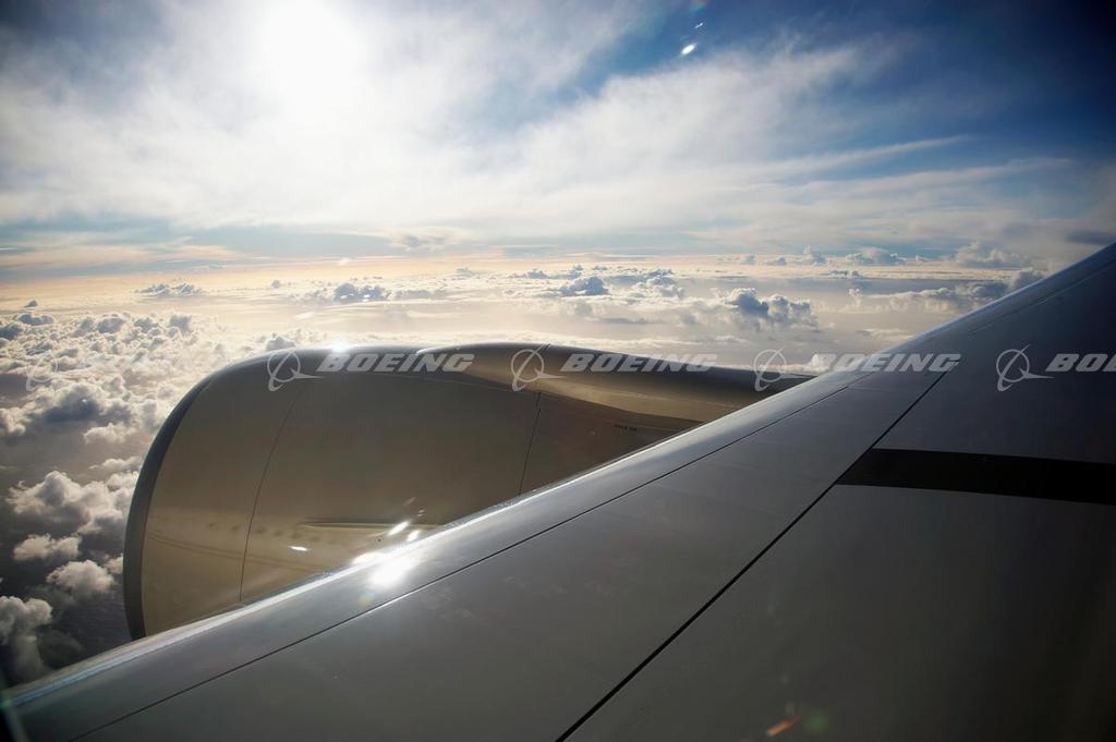 Boeing Images - 777-300ER Wing and Nacelle Above Clouds