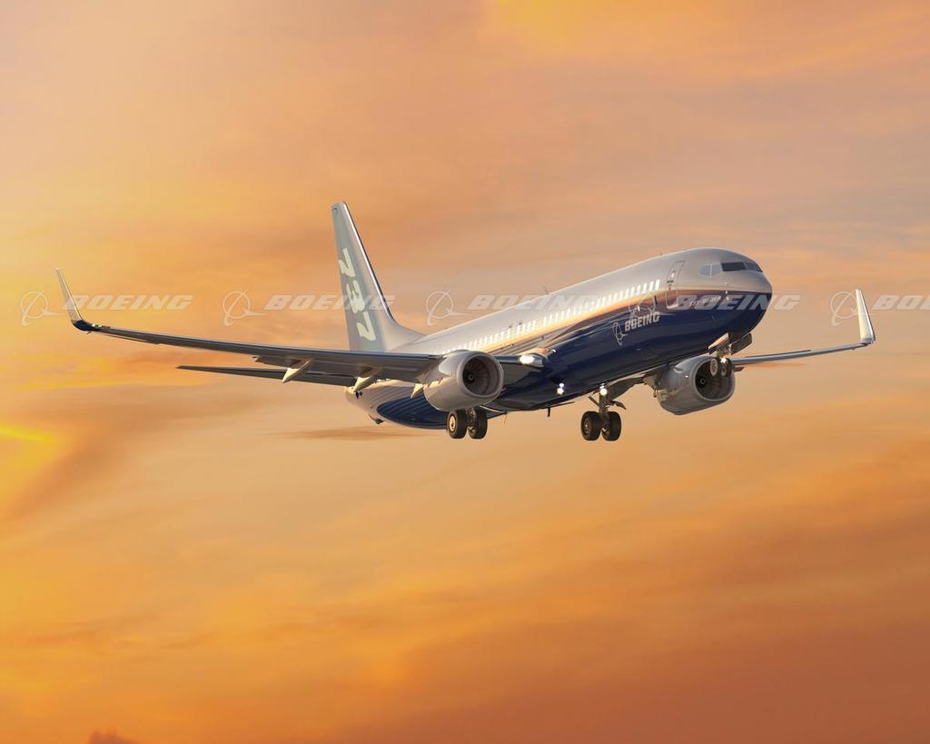 Boeing Images - 737-900ER in Flight at Sunset