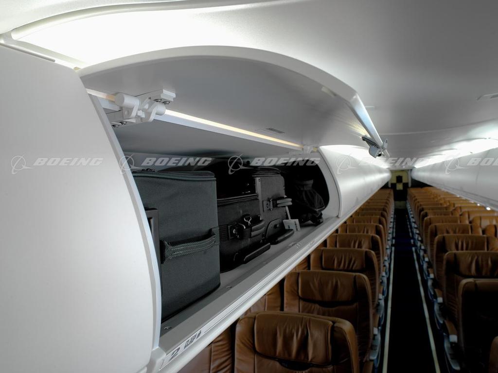 Boeing Images - Luggage in 717-200 Overhead Bins