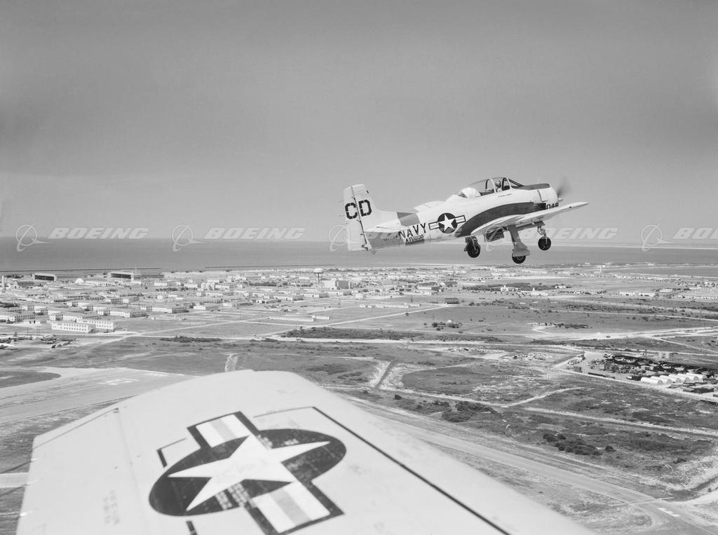 Boeing Images - T-28 Flying Above a City