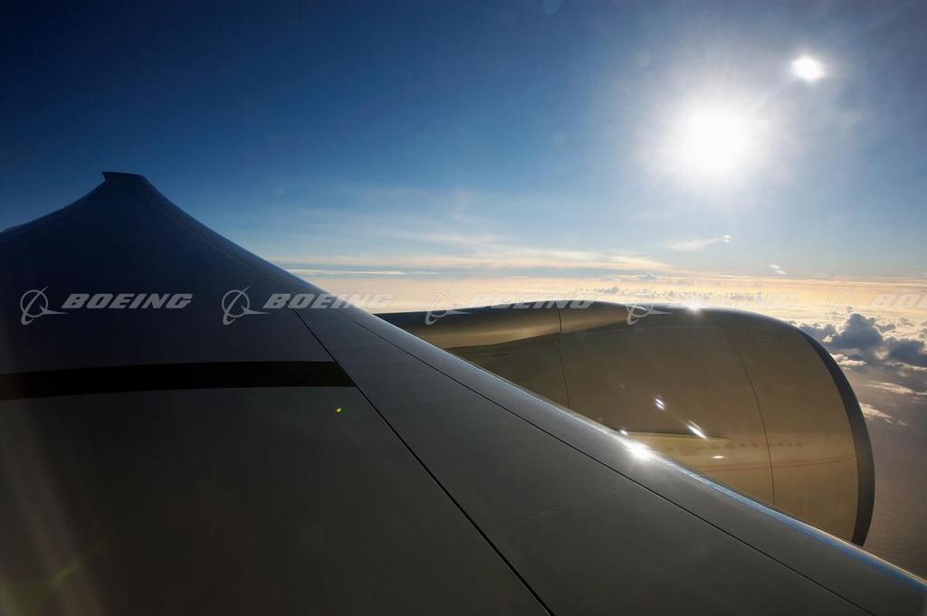 Boeing Images - 777-300ER Wing and Nacelle Above Clouds