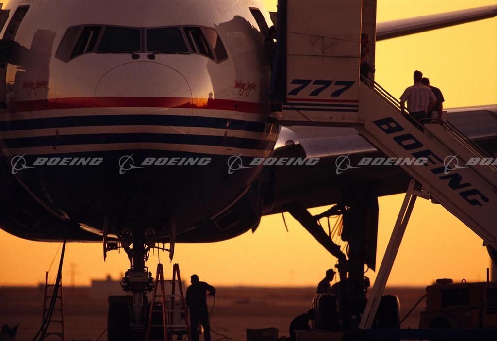 Boeing Images - 777 with Passenger Boarding Stairs
